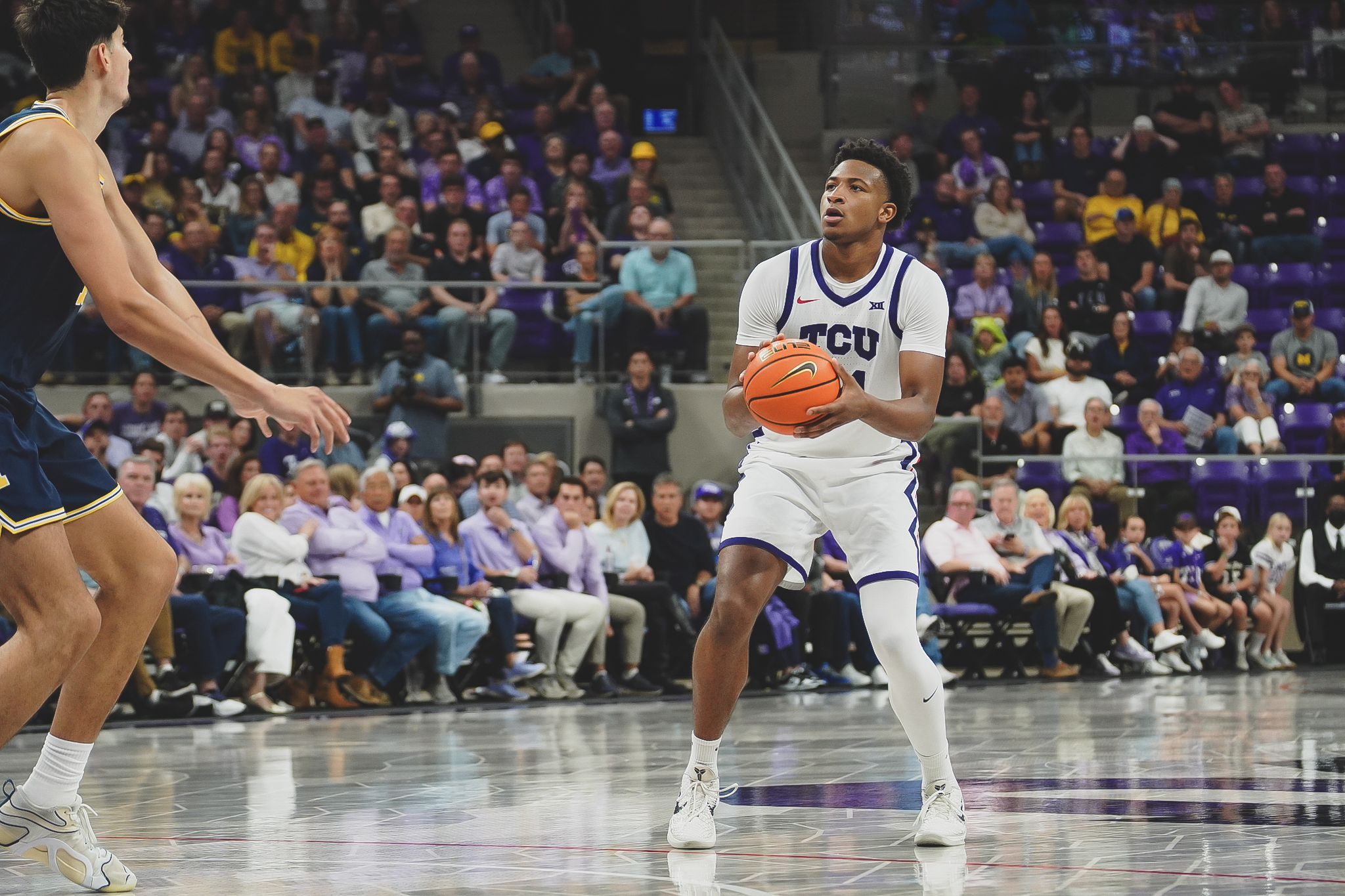 TCU Loses Late Lead, Falls 67–63 to No. 6 Michigan - D210SPORTS